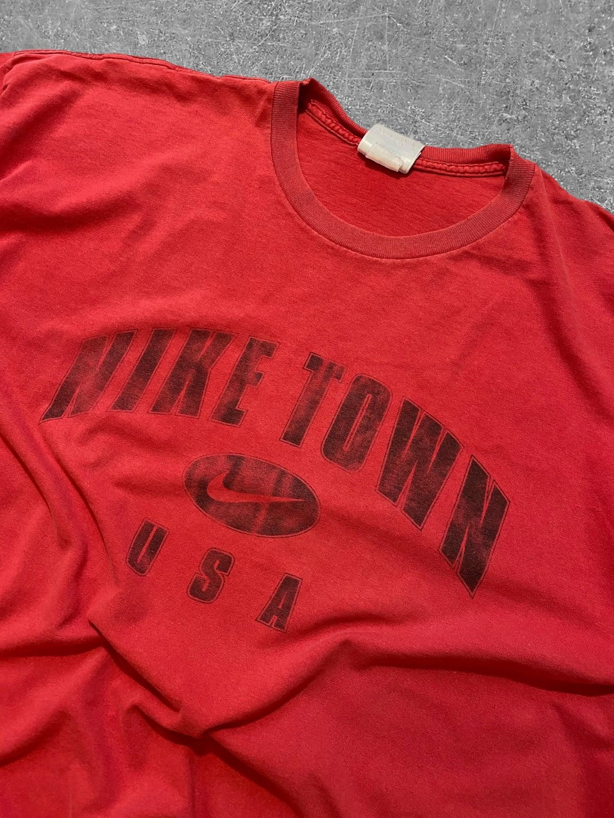 Nike Vintage big logo Nike town made in USA distressed tee | Grailed