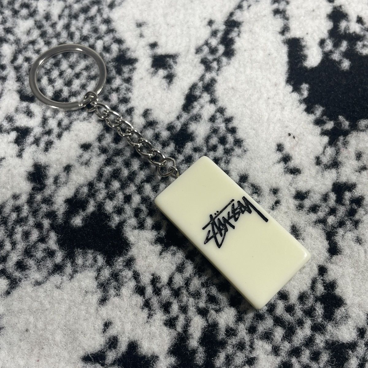 Vintage STUSSY DOMINO KEYCHAIN IN NATURAL | Grailed