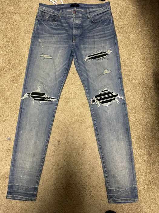 Amiri Blue Amiri denim with black leather patches | Grailed