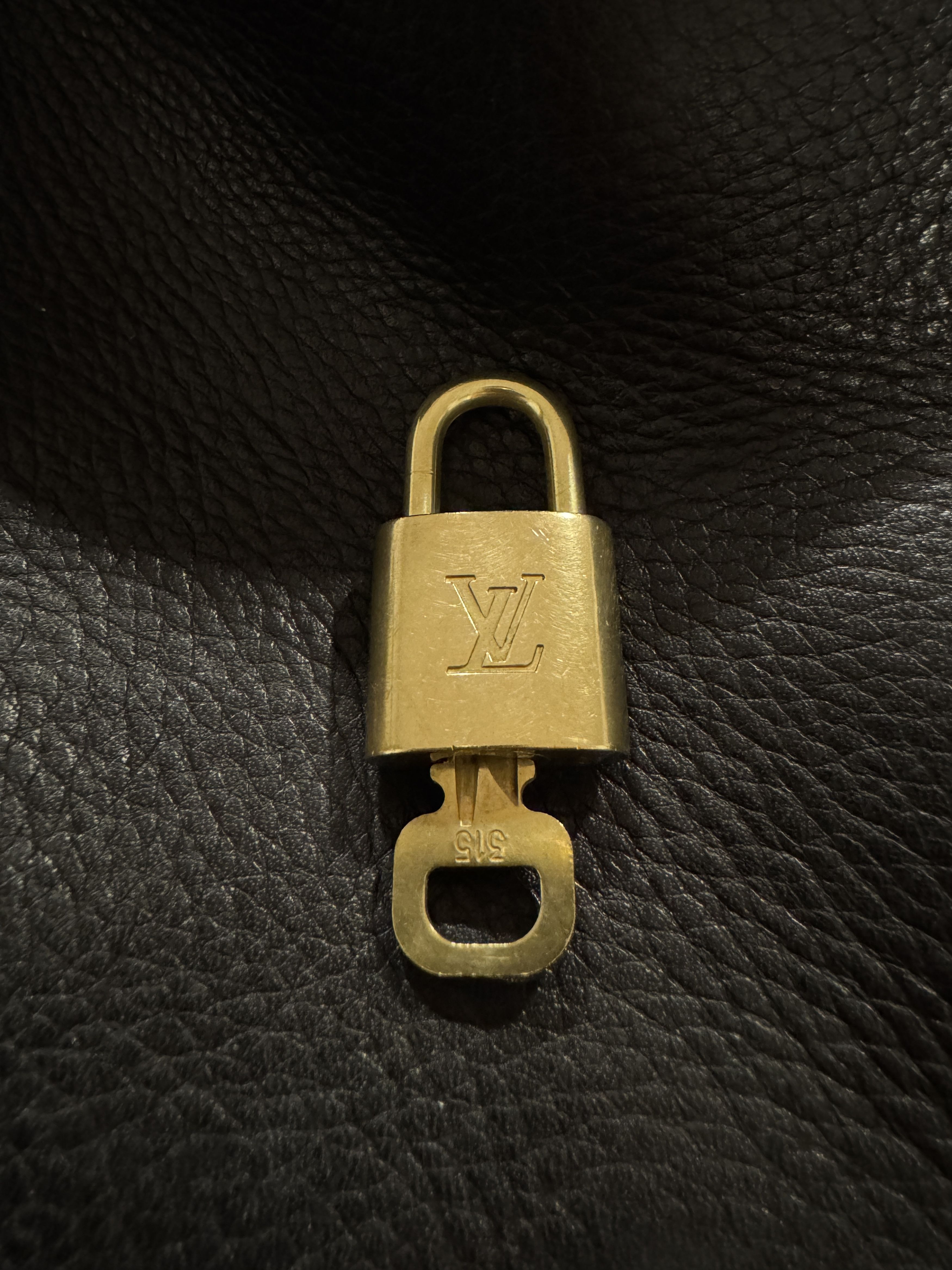 Louis Vuitton Vintage Louis Vuitton 315 lock with key #255 | Grailed
