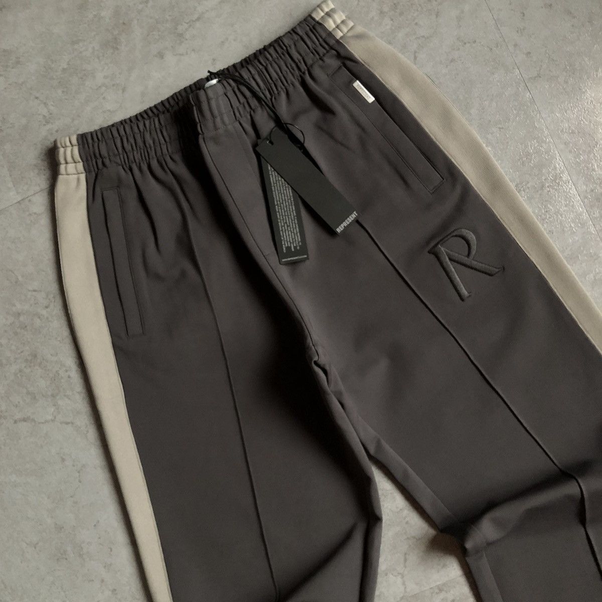 Represent Clo. REPRESENT CLO. INITIAL TRACK PANTS | Grailed