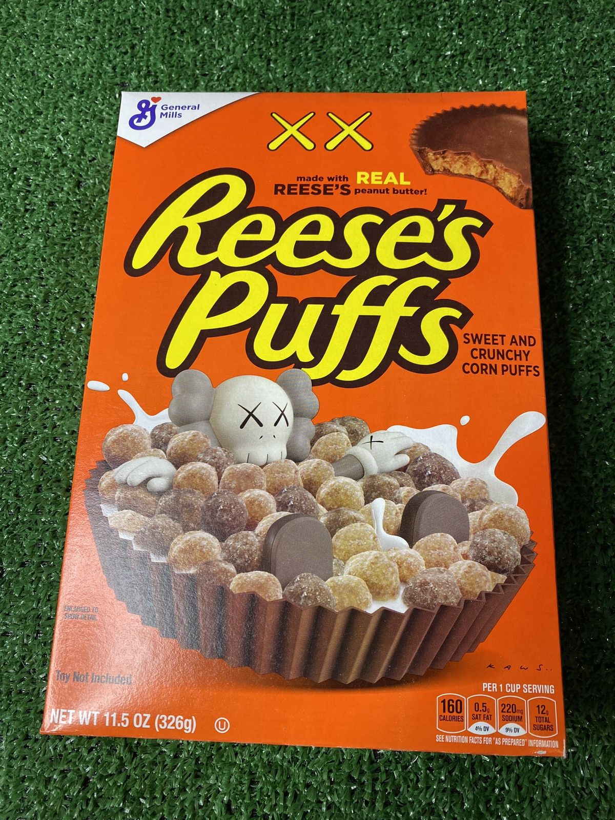 Kaws Reese’s Puffs x KAWS Limited Edition Cereal Box | Grailed