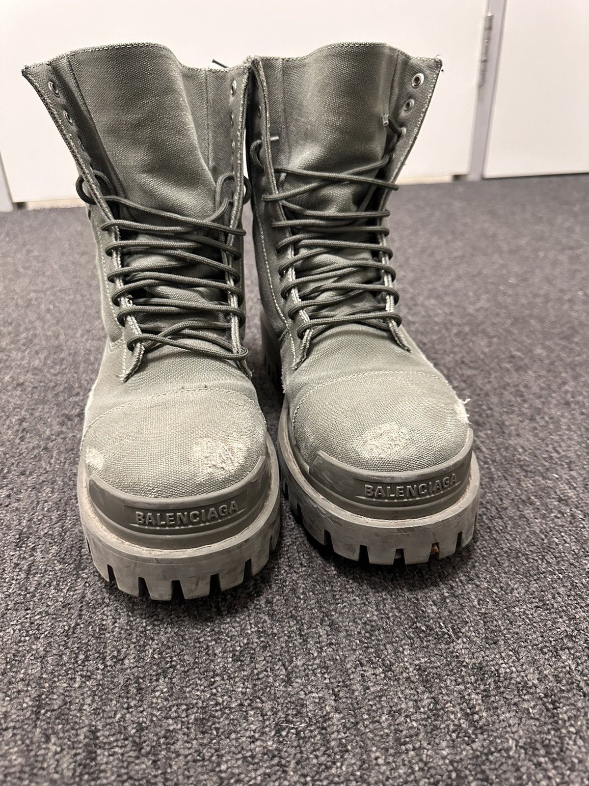 Balenciaga Balenciaga distressed strike boots | Grailed