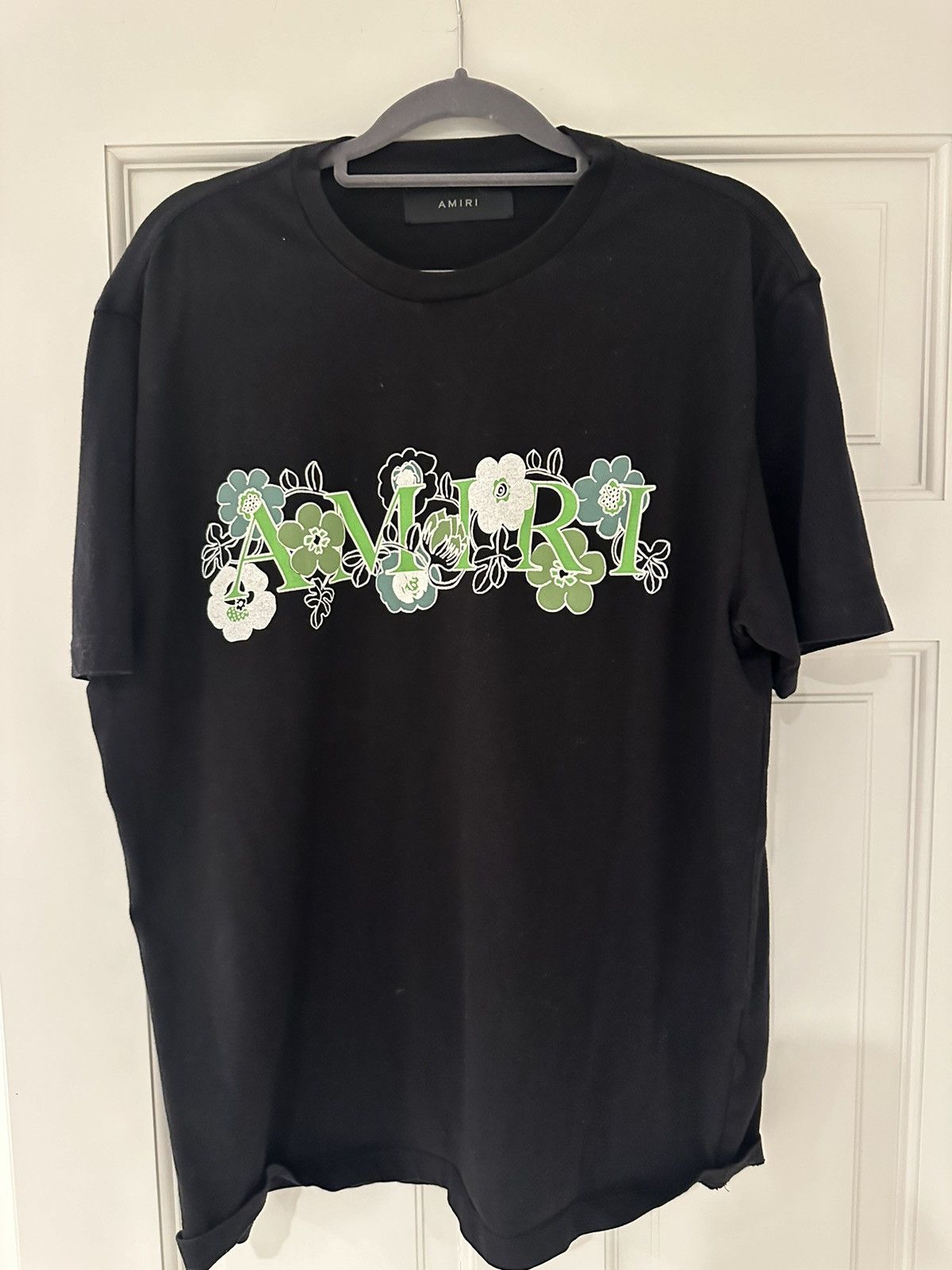 Amiri Amiri flower Print black logo T shirt | Grailed