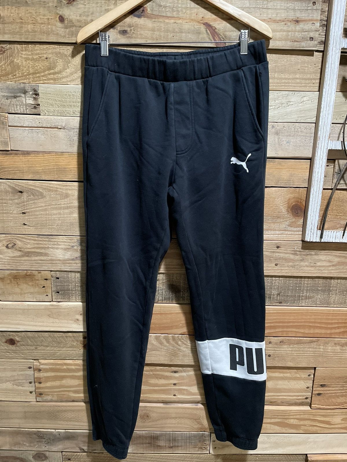 Puma Puma sweatpants with logo on the leg | Grailed