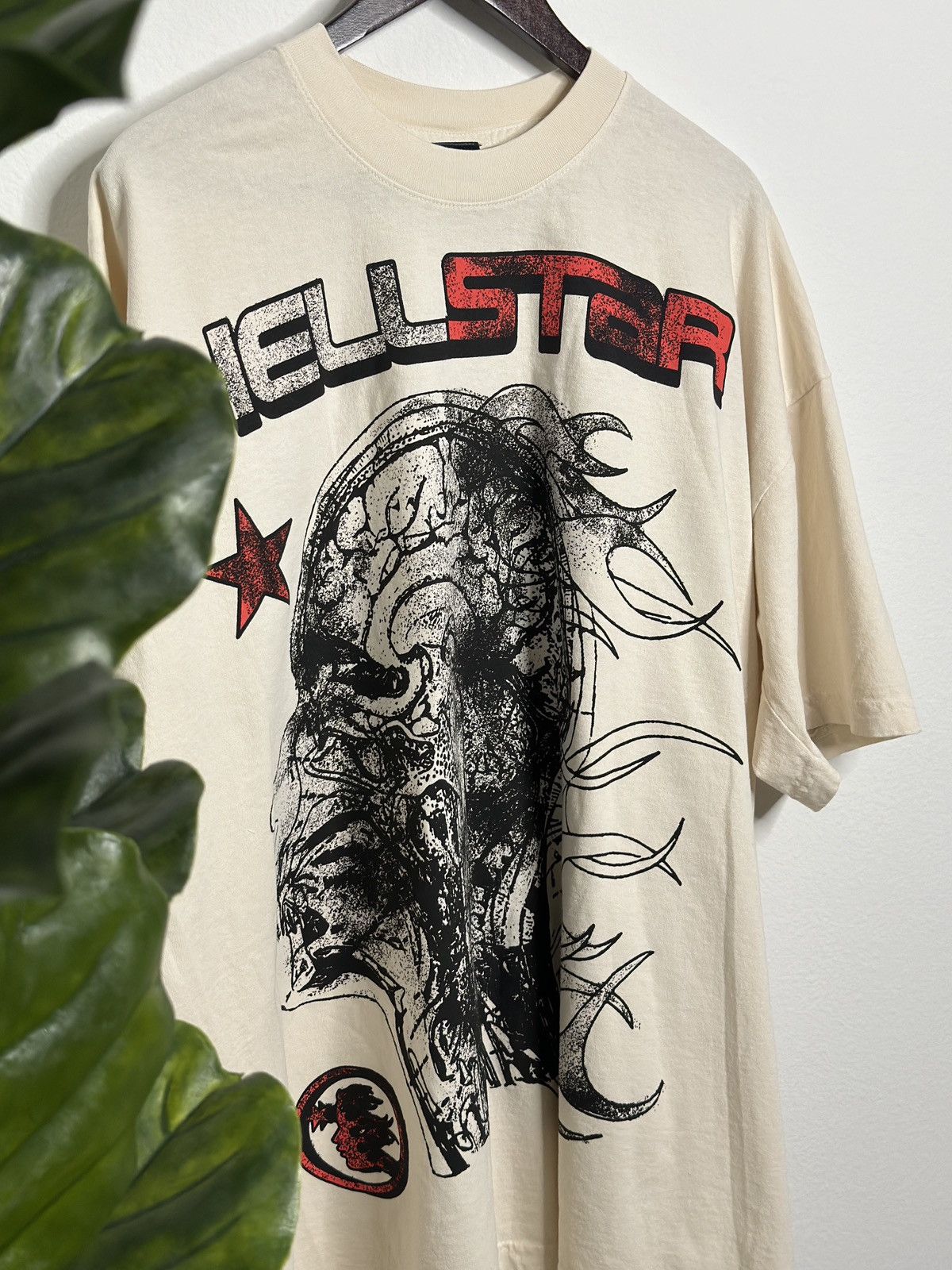 HELLSTAR Hellstar Studios Human Development Tee Cream | Grailed