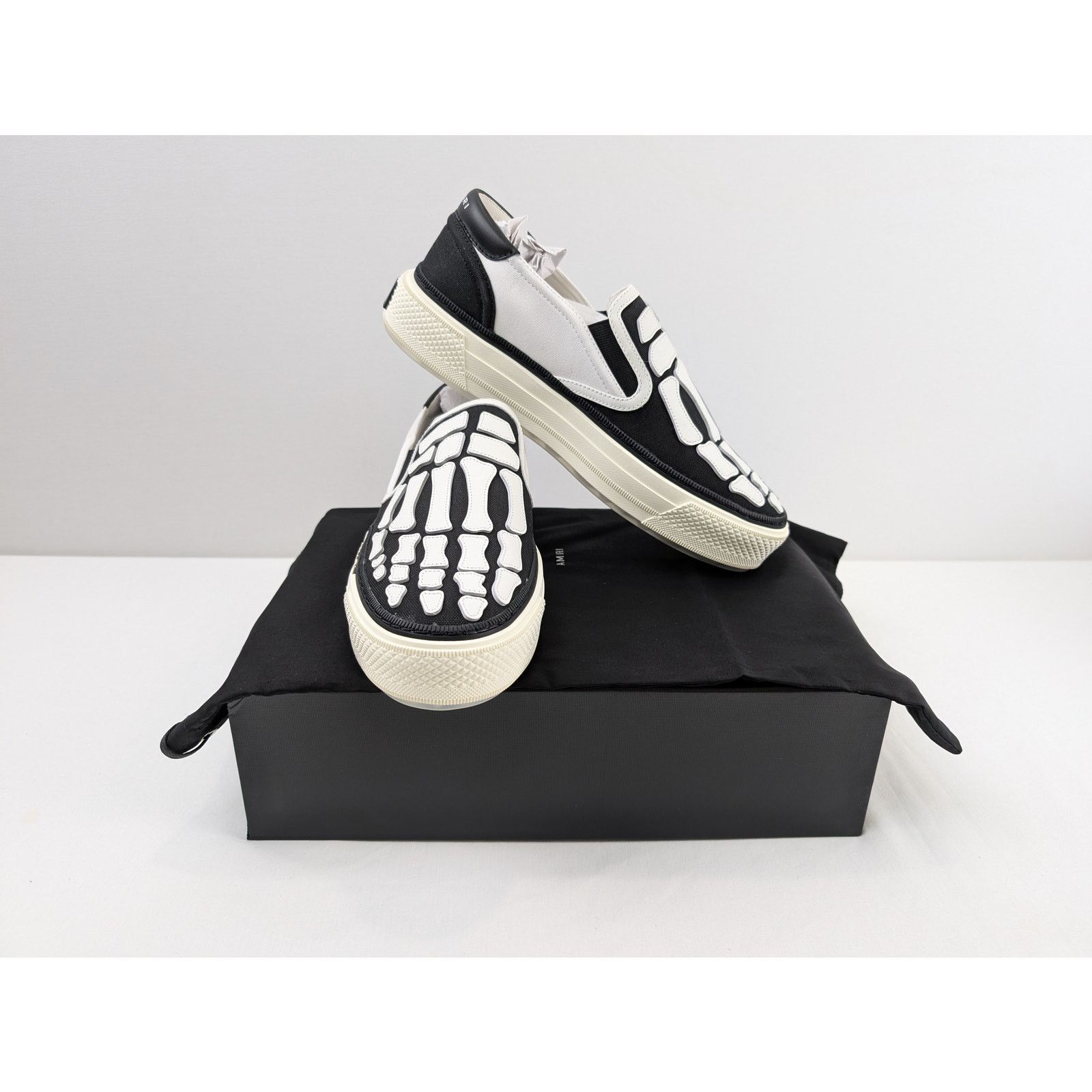 Amiri o1rshd1 Skel Skeleton Top Slip on Sneakers Shoe White/Black | Grailed