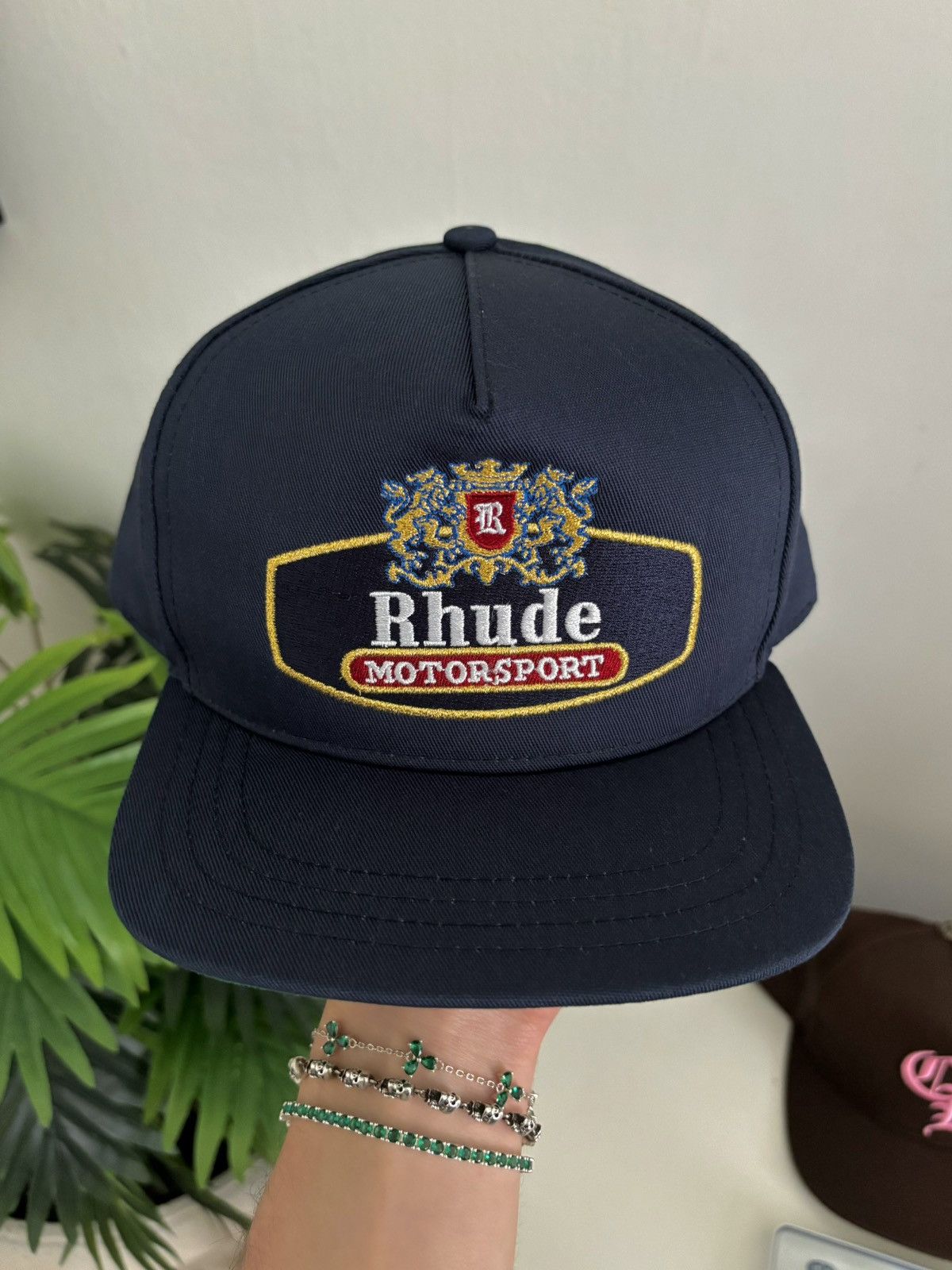 Rhude RHUDE “CREST MOTORSPORTS RACING F1” HAT | Grailed