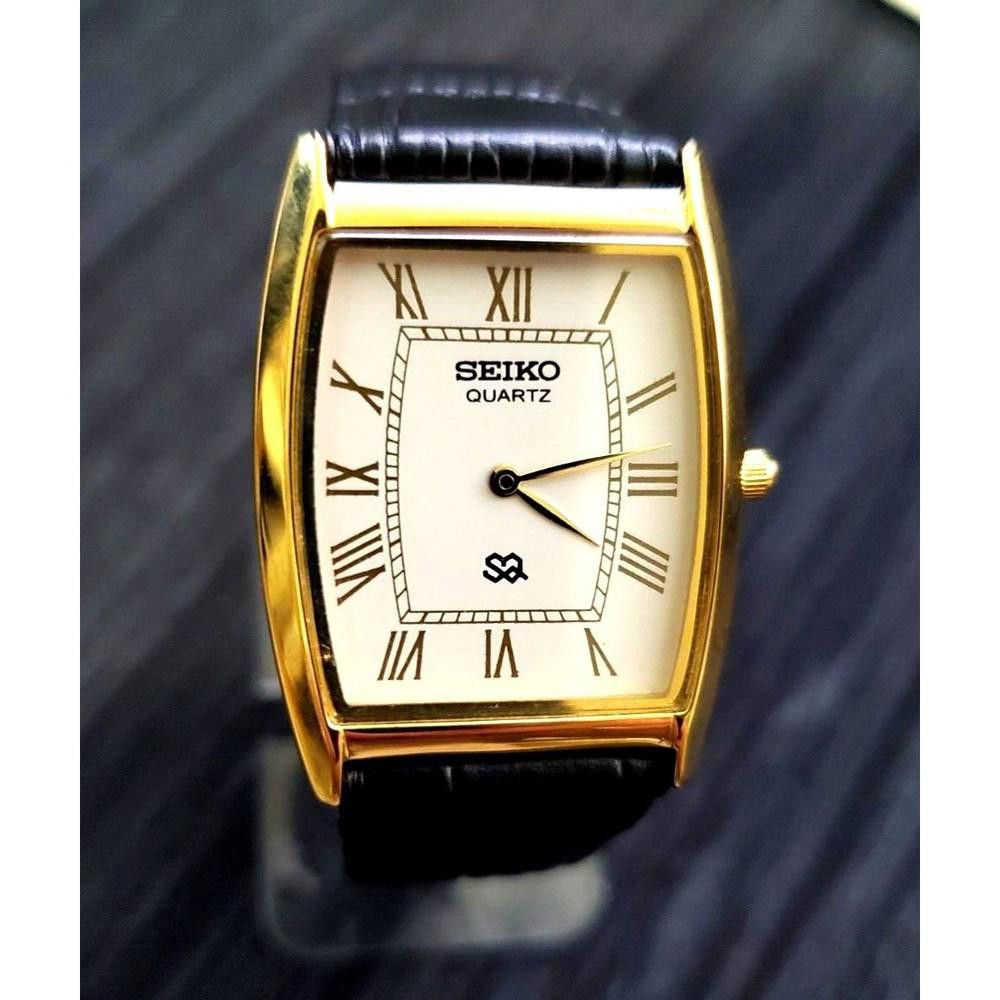 Seiko RARE Vintage Seiko Men's Classic Tank Barrel Gold White | Grailed