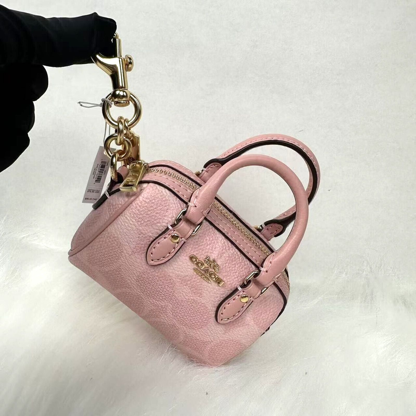 Coach Coach Mini Rowan Bag Charm Signature Canvas Gold/Powder Pink ...