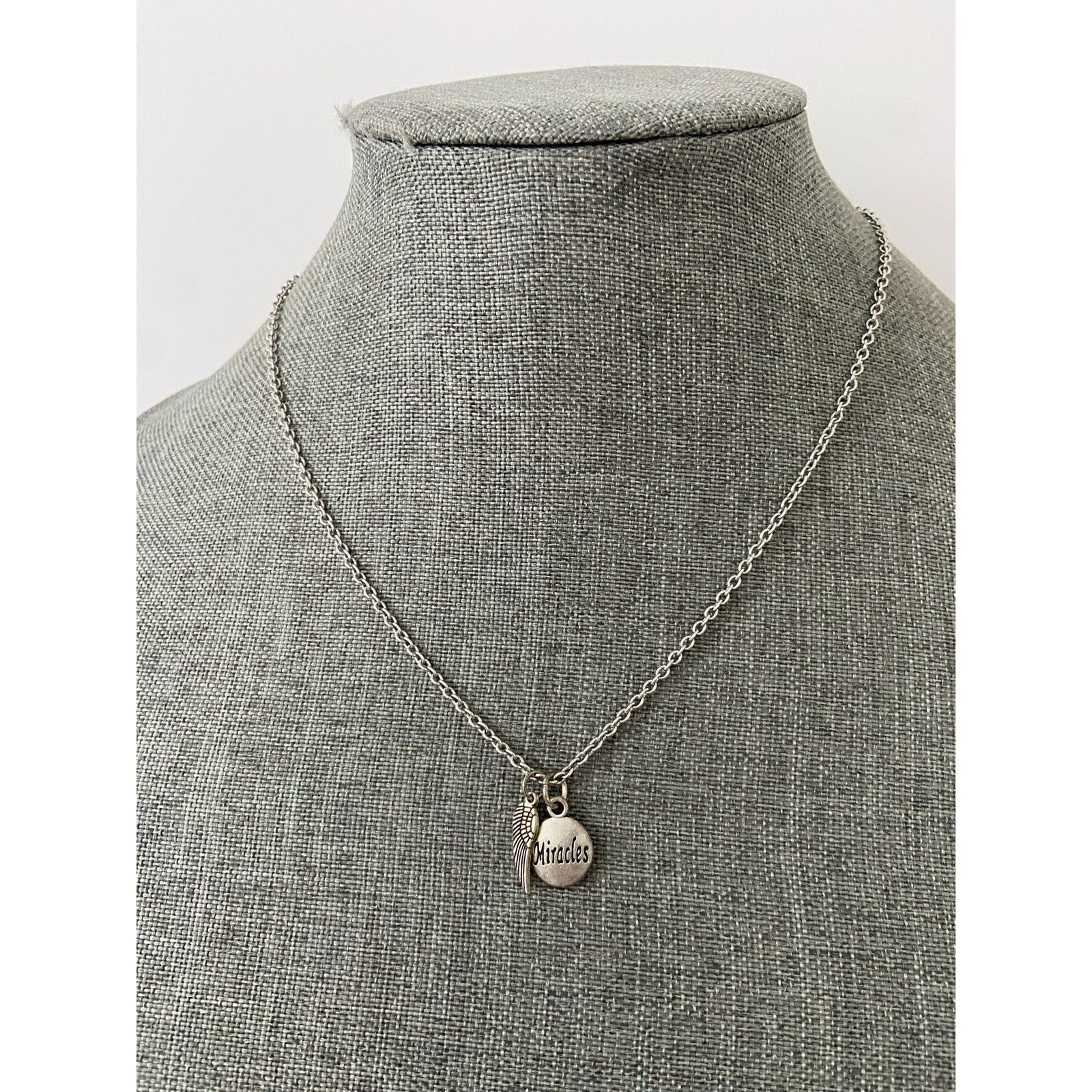 Generic Miracles angel wing pendant necklace | Grailed