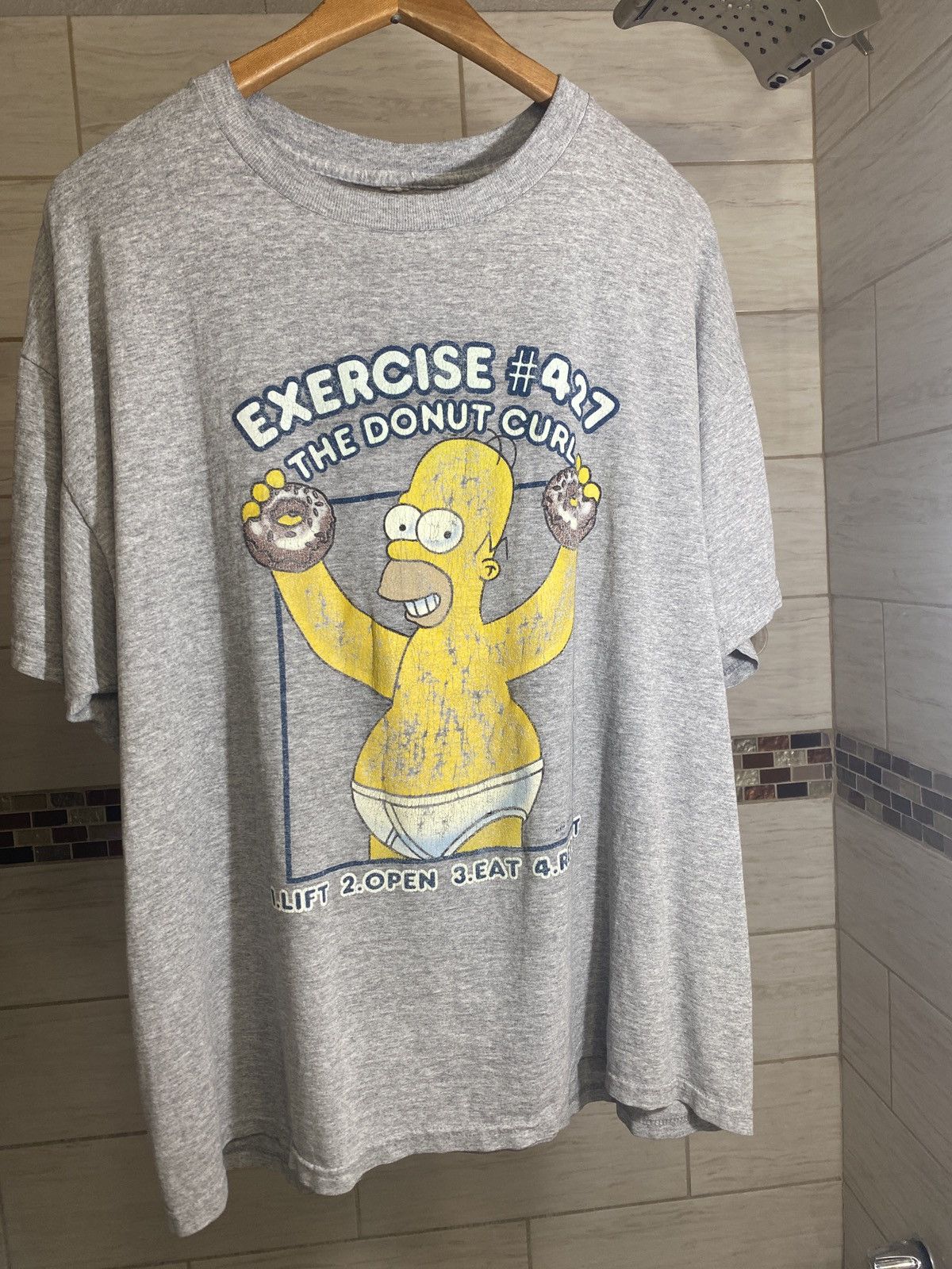 Humor × The Simpsons × Vintage 02’ Homer Simpson Donut Exercise Tee ...