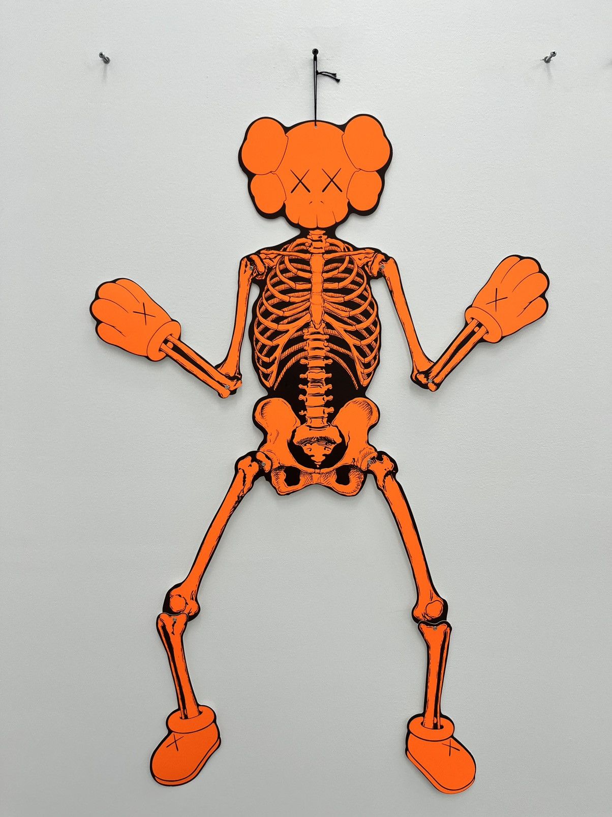 Kaws KAWS Orange Companion Skeleton 2021 Cutout Wall Hanging | Grailed