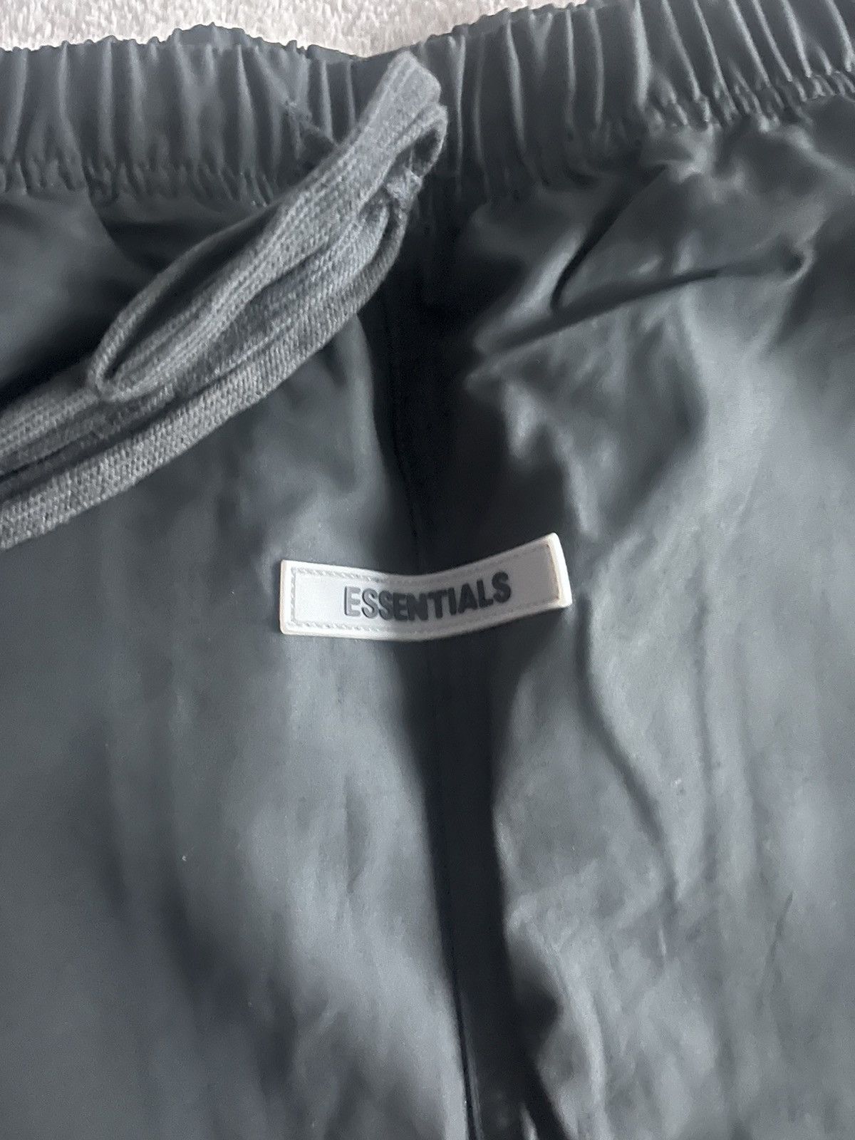 Essentials × Fear of God Essentials track pants | Grailed