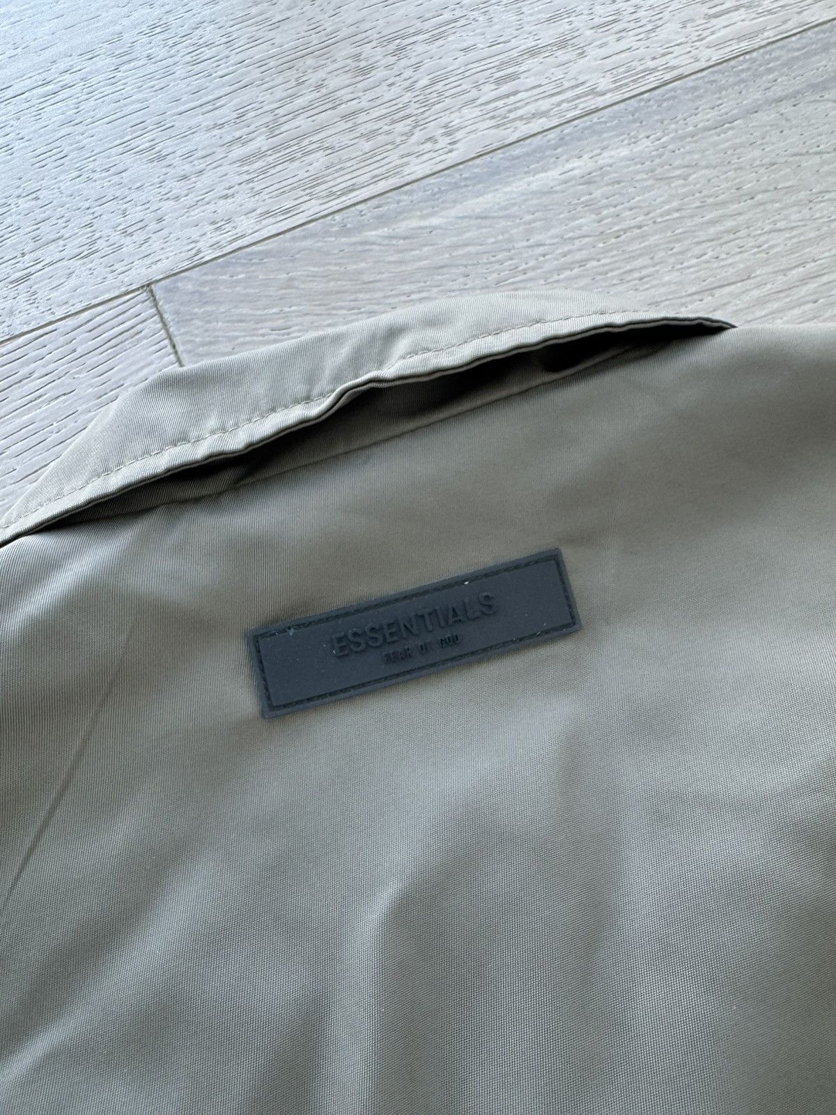 Essentials Fear of god essentials 1977 coach jacket brown | Grailed