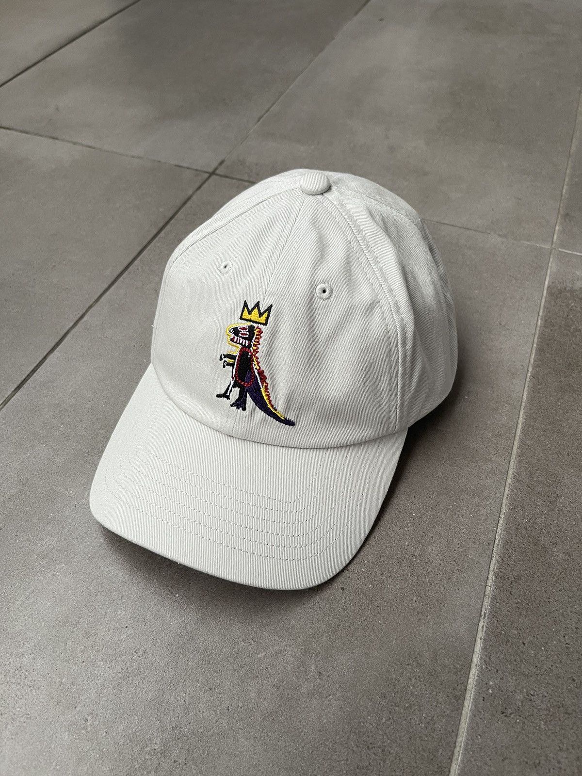 Etudes !DS! SS23 Etudes X Jean Michel Basquiat Booster Cream Cap | Grailed