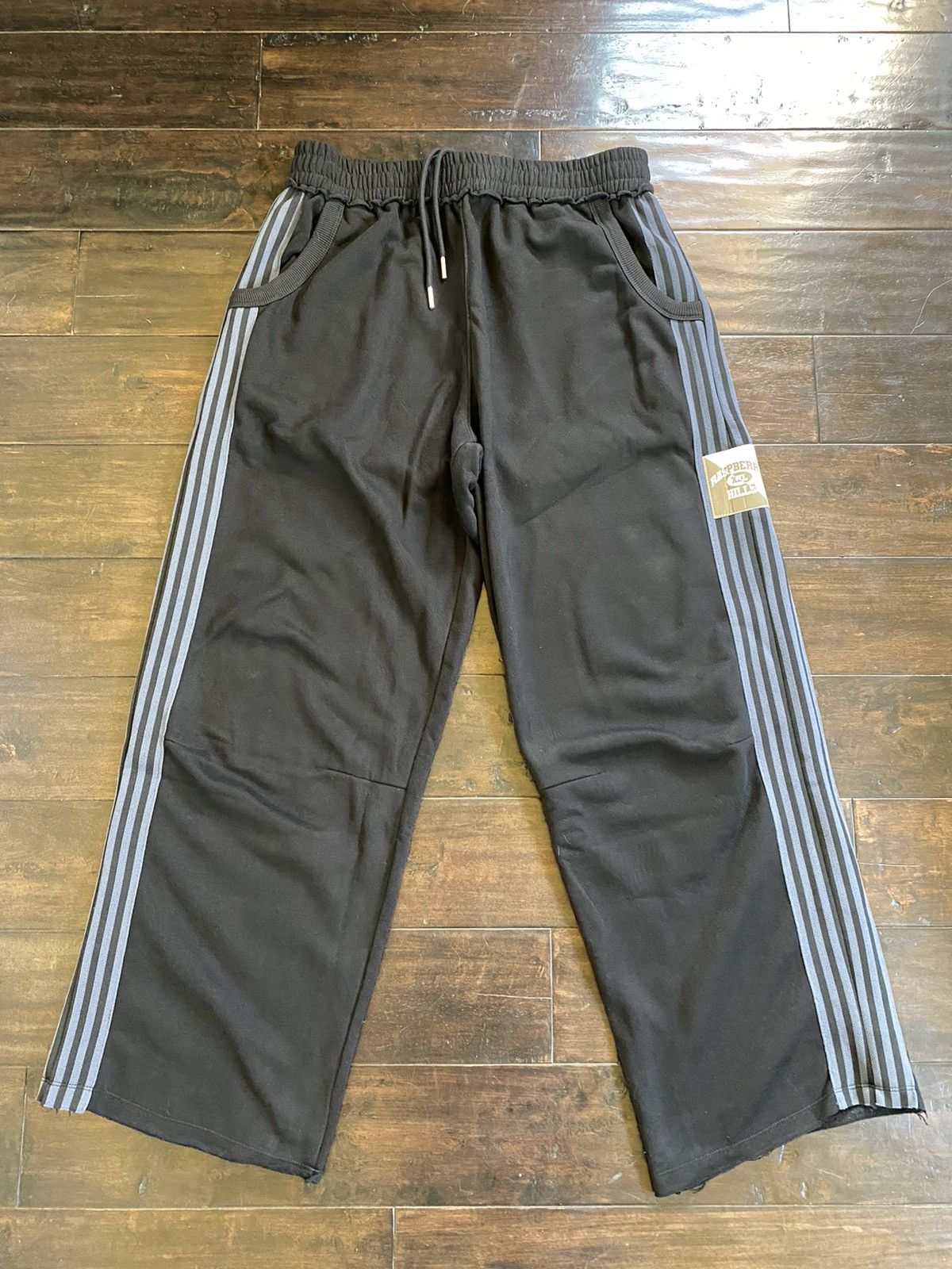 The GV Gallery The GV Gallery Triple Black Lil Leon Flared Sweats | Grailed