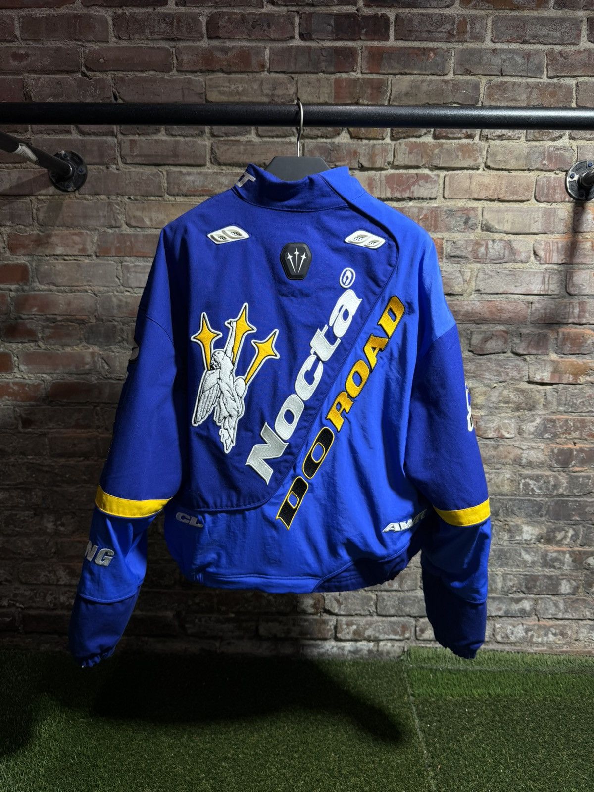 NOCTA × Nike Nike x Nocta L’Art Racing Jacket | Grailed