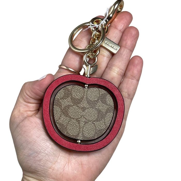 Coach Coach Spinning Apple Bag Charm in Signature Canvas Keychain | Grailed
