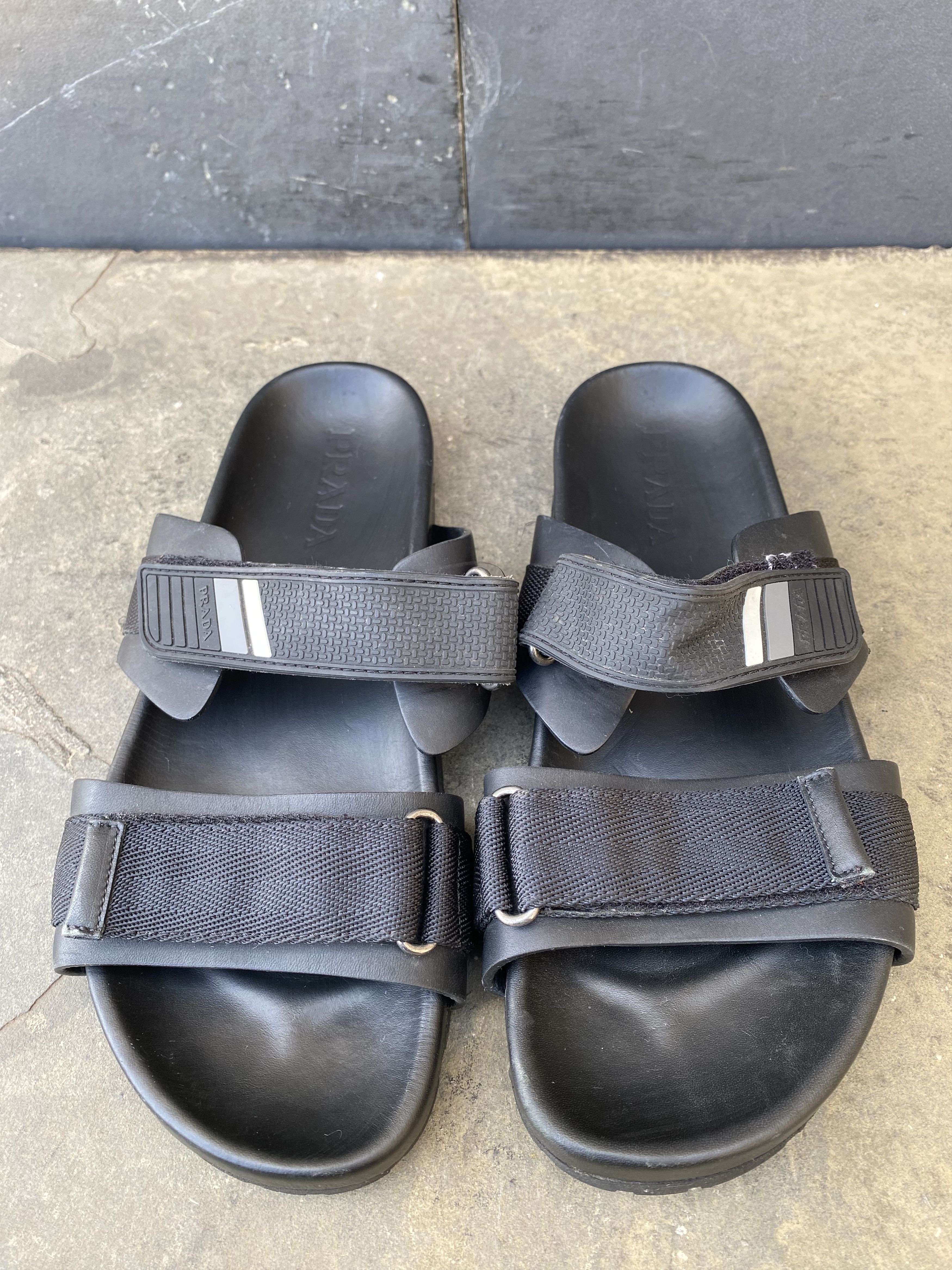 Prada Prada Linea Rossa Logo Embossed Black Rubber Slides Sandals | Grailed