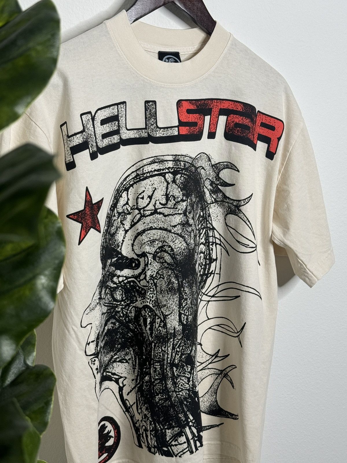 HELLSTAR Hellstar Studios Human Development Tee Cream | Grailed