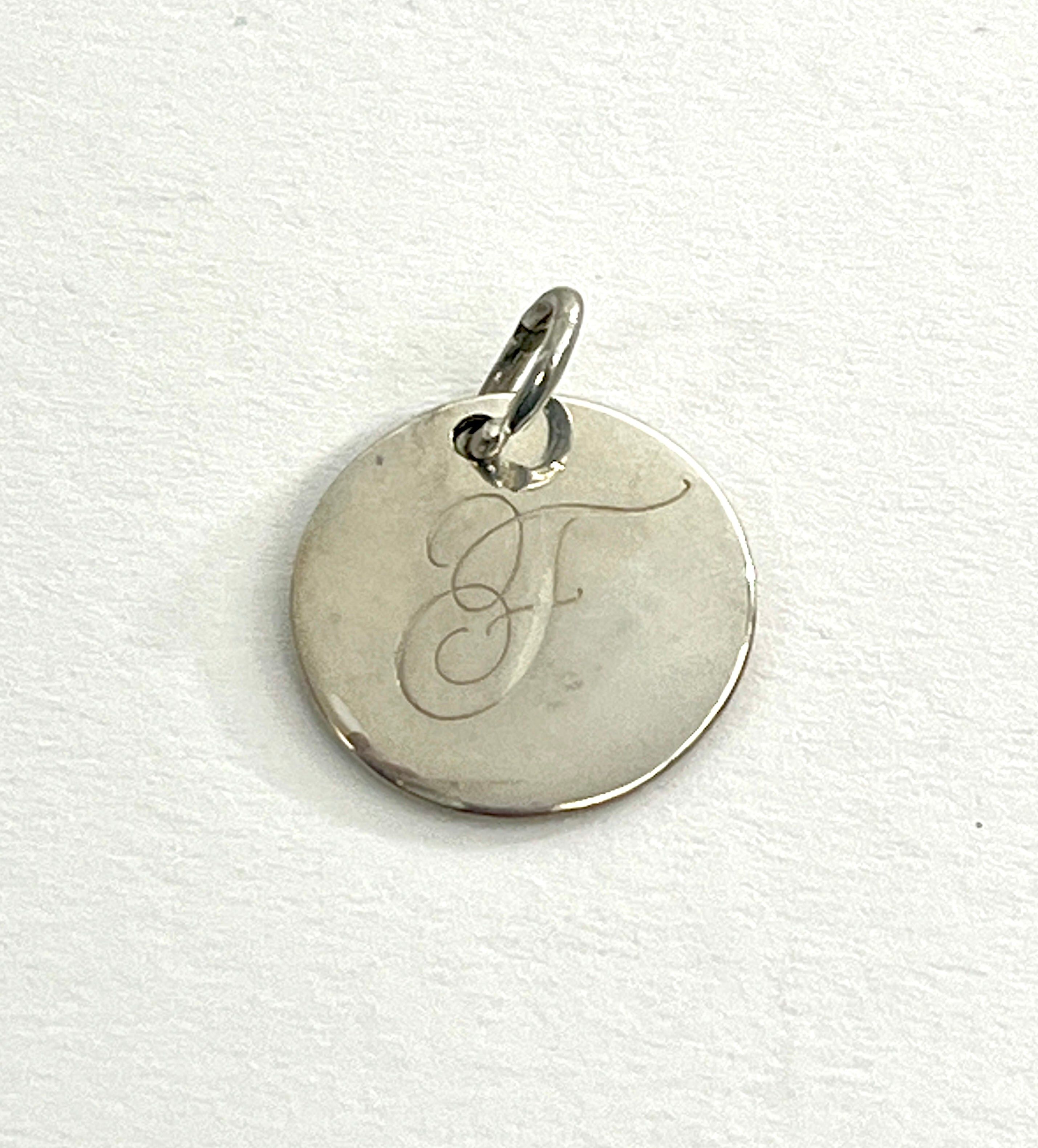 Tiffany & Co. Tiffany & Co Sterling Silver Round Tag Charm Pendent ...