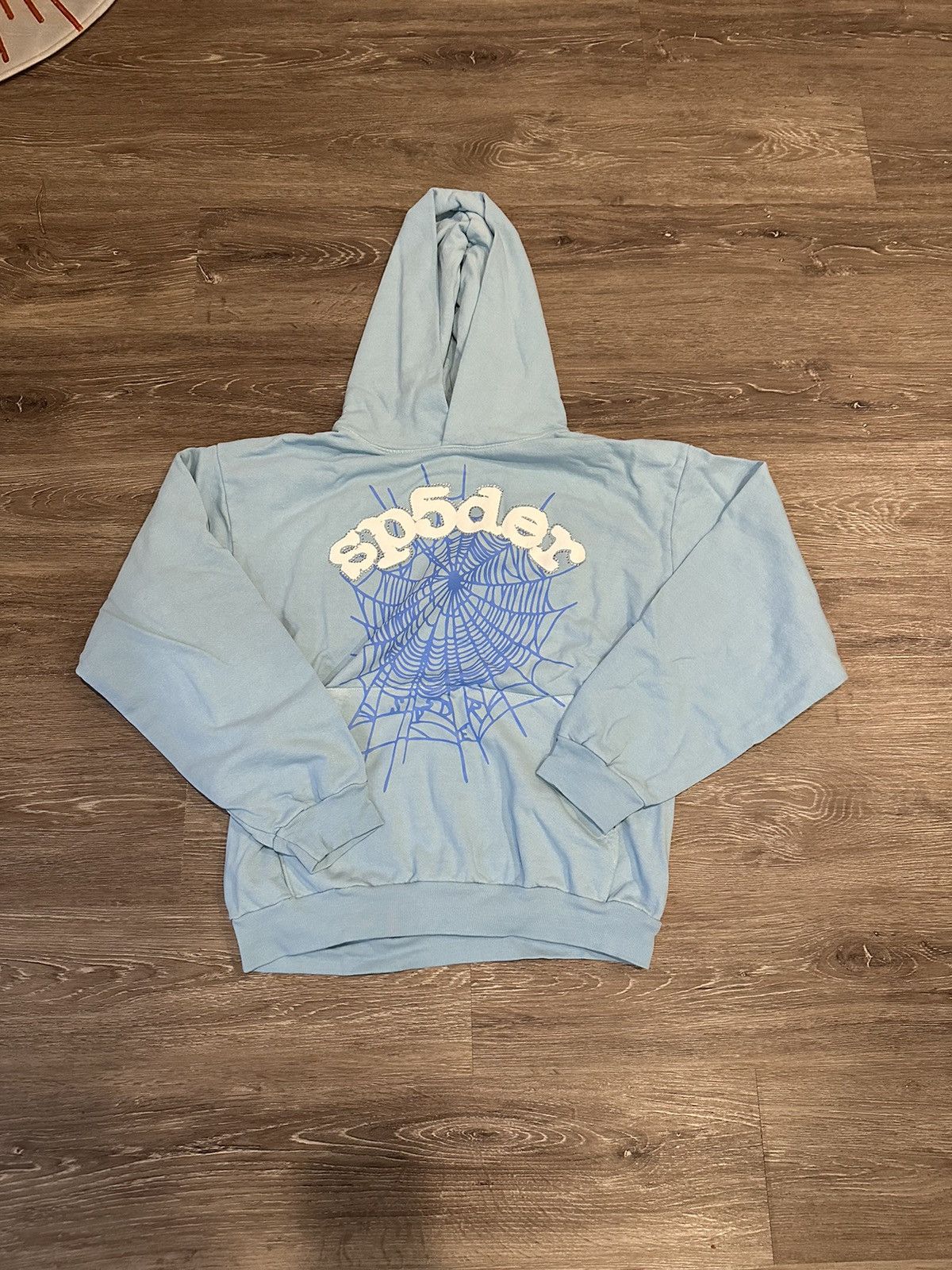Spider Worldwide Spider web logo hoodie sky blue large new | Grailed