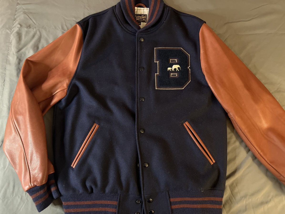 The Brooklyn Circus The Brooklyn Circus’s “Shelby Blues” Varsity Jacket ...