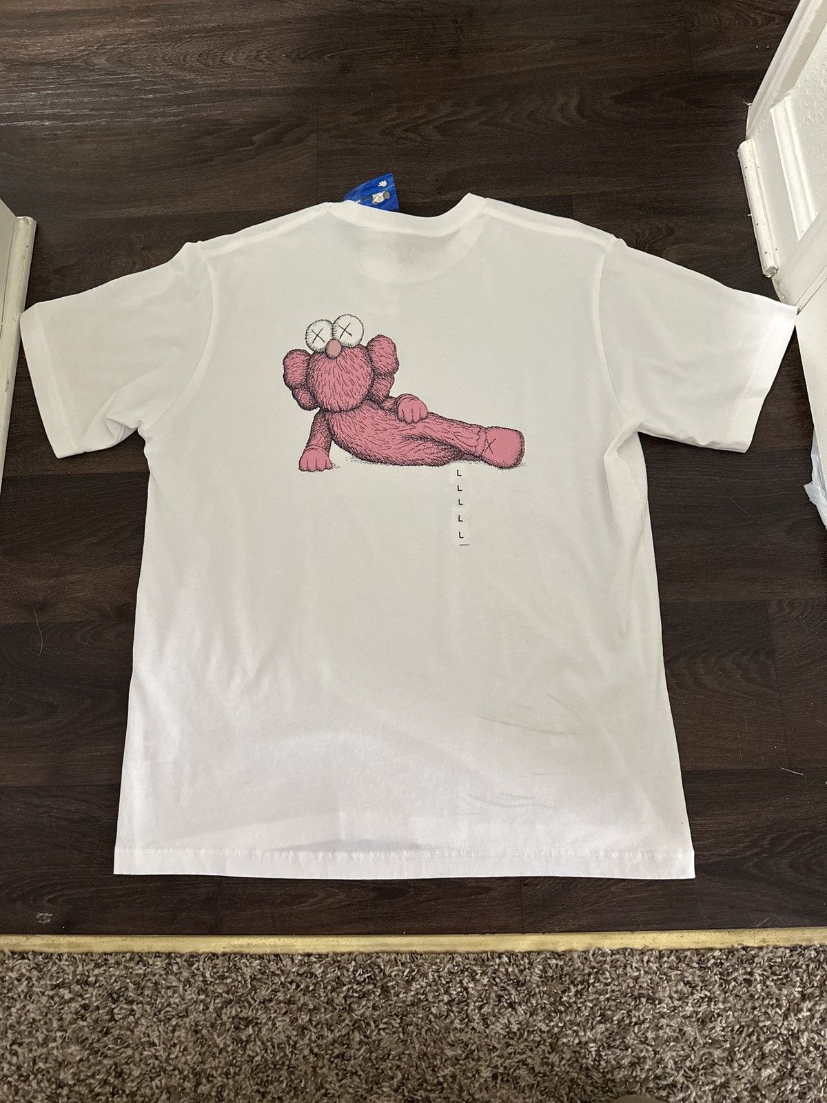 Kaws Kaws & Uniqlo collab ‘23 | Grailed