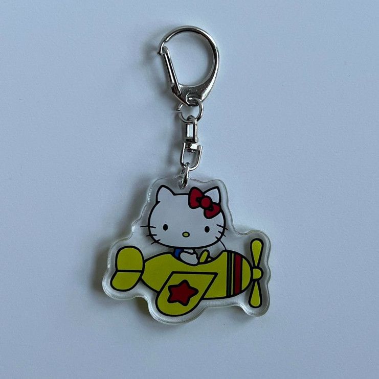 Vintage Y2K 2000s super cute hello kitty airplane keychain | Grailed
