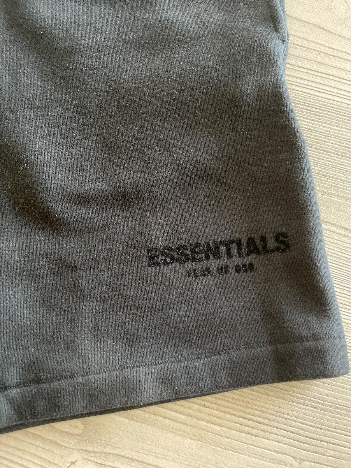 Pacsun Fear of god essentials shorts black | Grailed