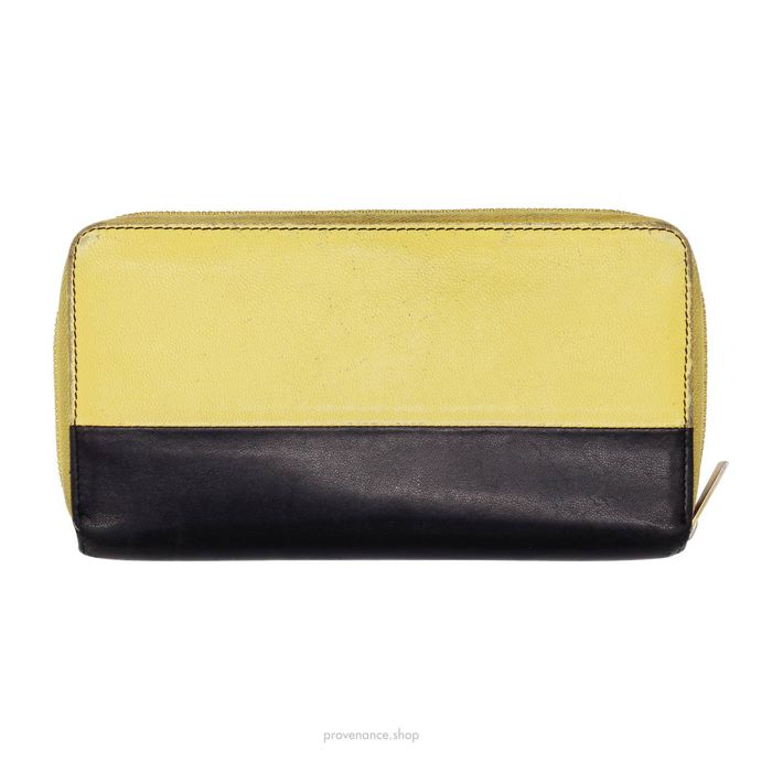Celine 🔴 Celine Multifunction Zip Wallet - Yellow/Black | Grailed
