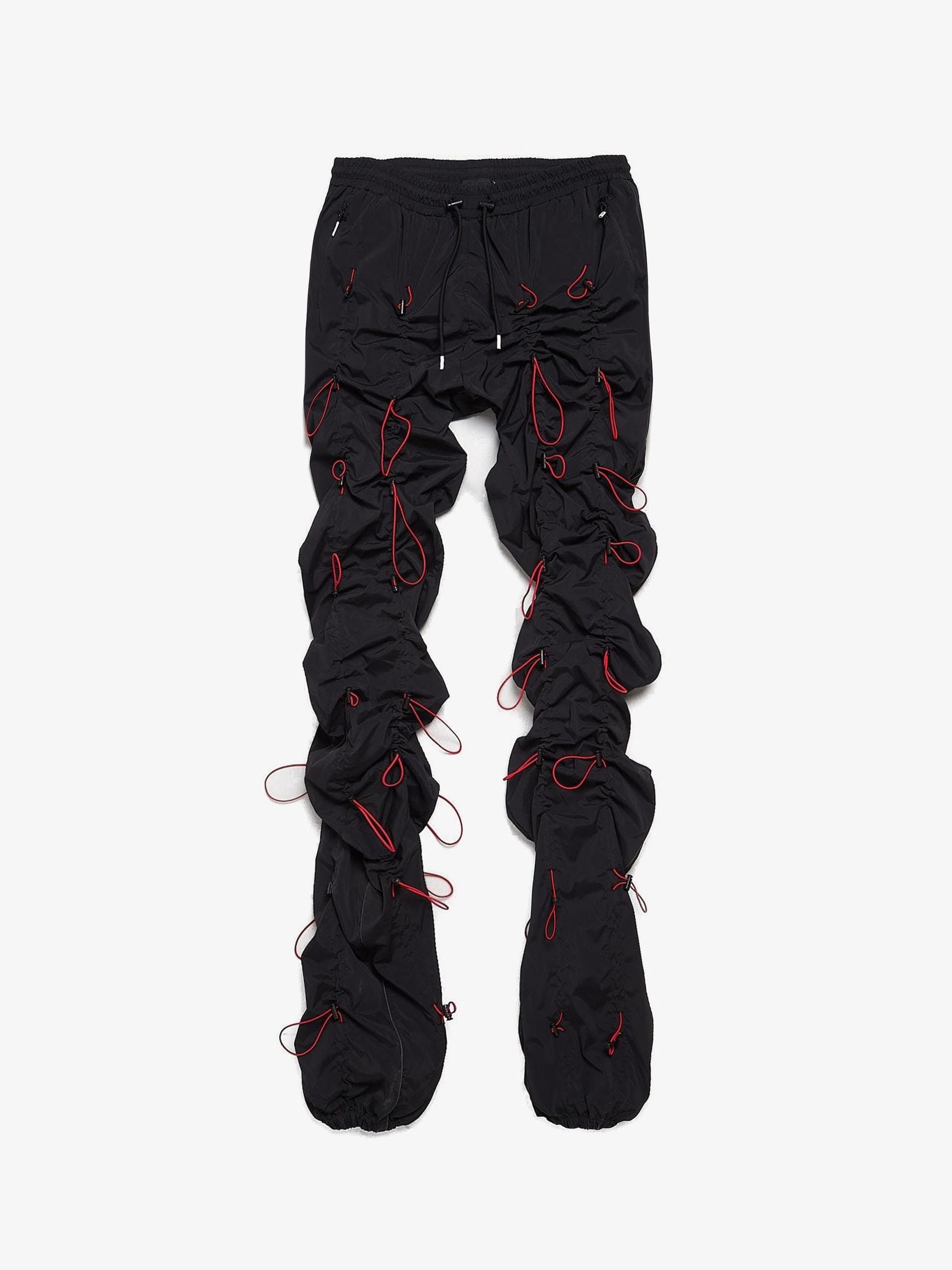 99%Is Black Seamed Red Puffs Nylon Pants | Grailed