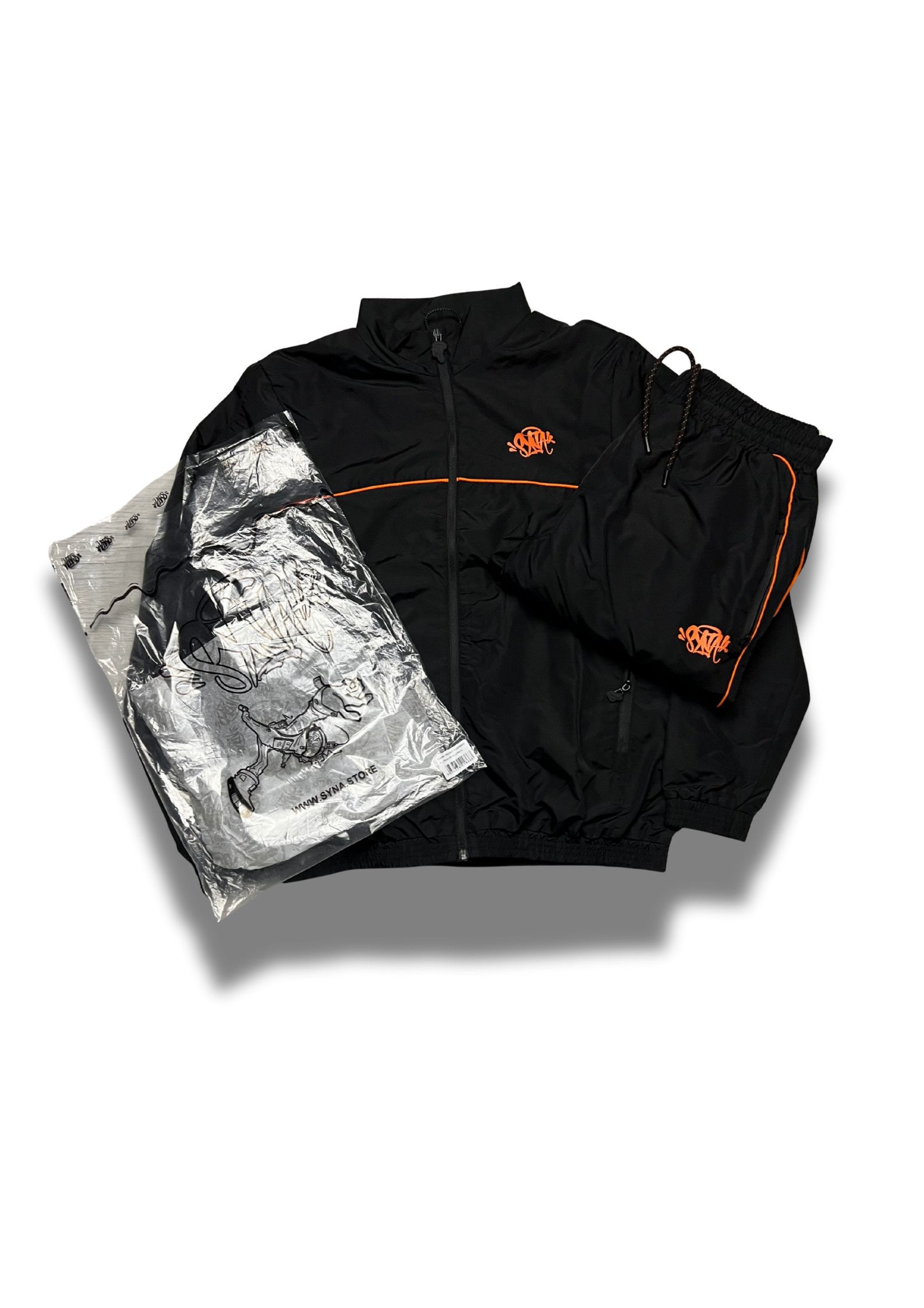 Syna World Syna World Shell Tracksuit “BLACK / ORANGE” | Grailed