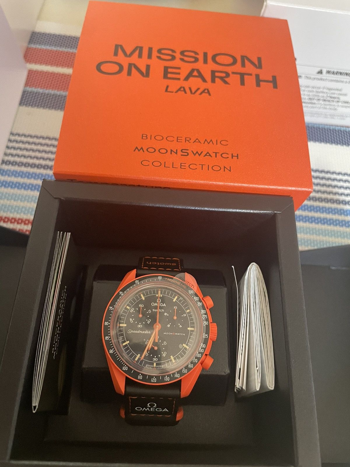 Swatch Omega x Swatch Mission On Earth MoonSwatch Speedmaster Lava ...