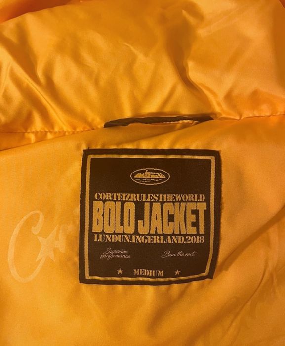 Corteiz Corteiz Bolo V2 Puffer Jacket Black and Yellow | Grailed