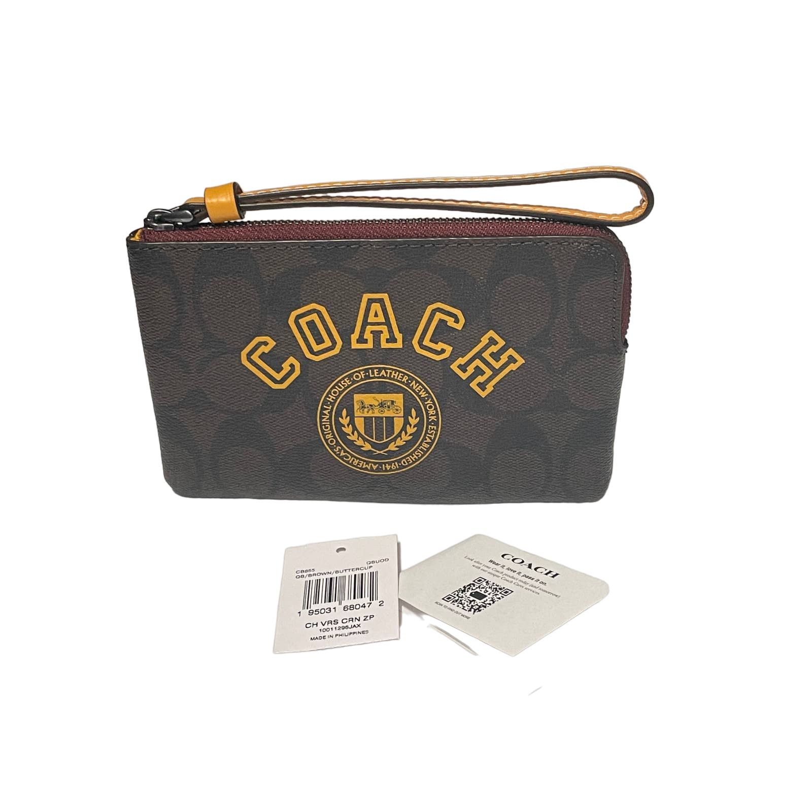Coach Coach Corner Zip Wristlet In Signature Canvas With Varsity | Grailed