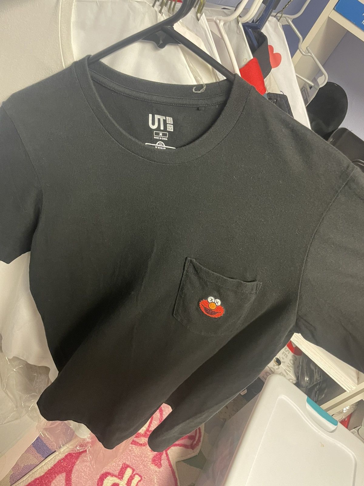 Uniqlo Uniqlo x KAWS Sesame Street Elmo Pocket Tee | Grailed