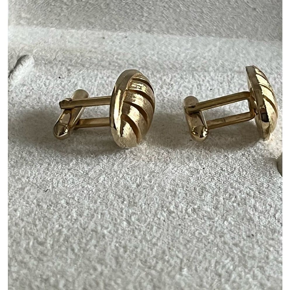Vintage SWANK Vintage Gold tone brushed oval cufflinks | Grailed