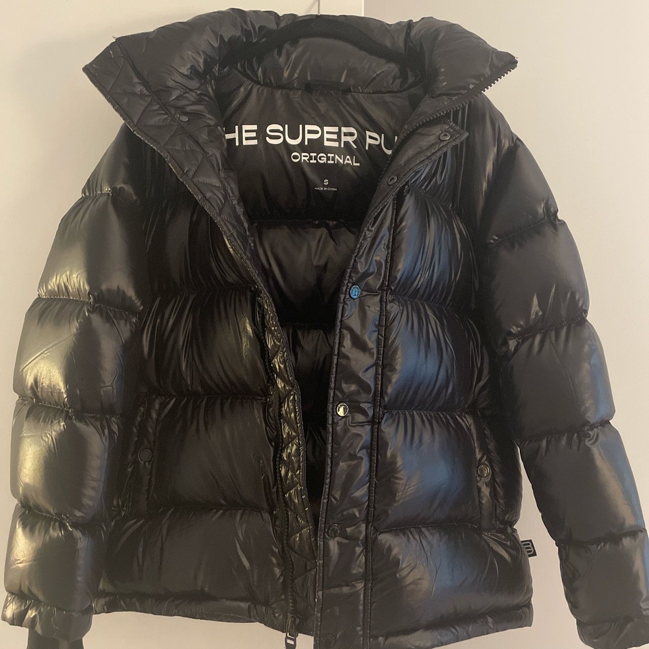 Aritzia Aritzia Super World Super Puff Jacket in Hi-Gloss Black. | Grailed
