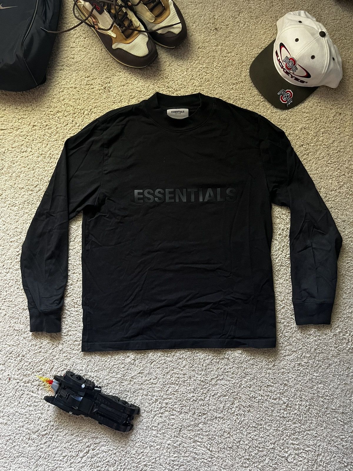 Essentials × Fear of God Essentials Black Long Sleeve T-Shirt front ...