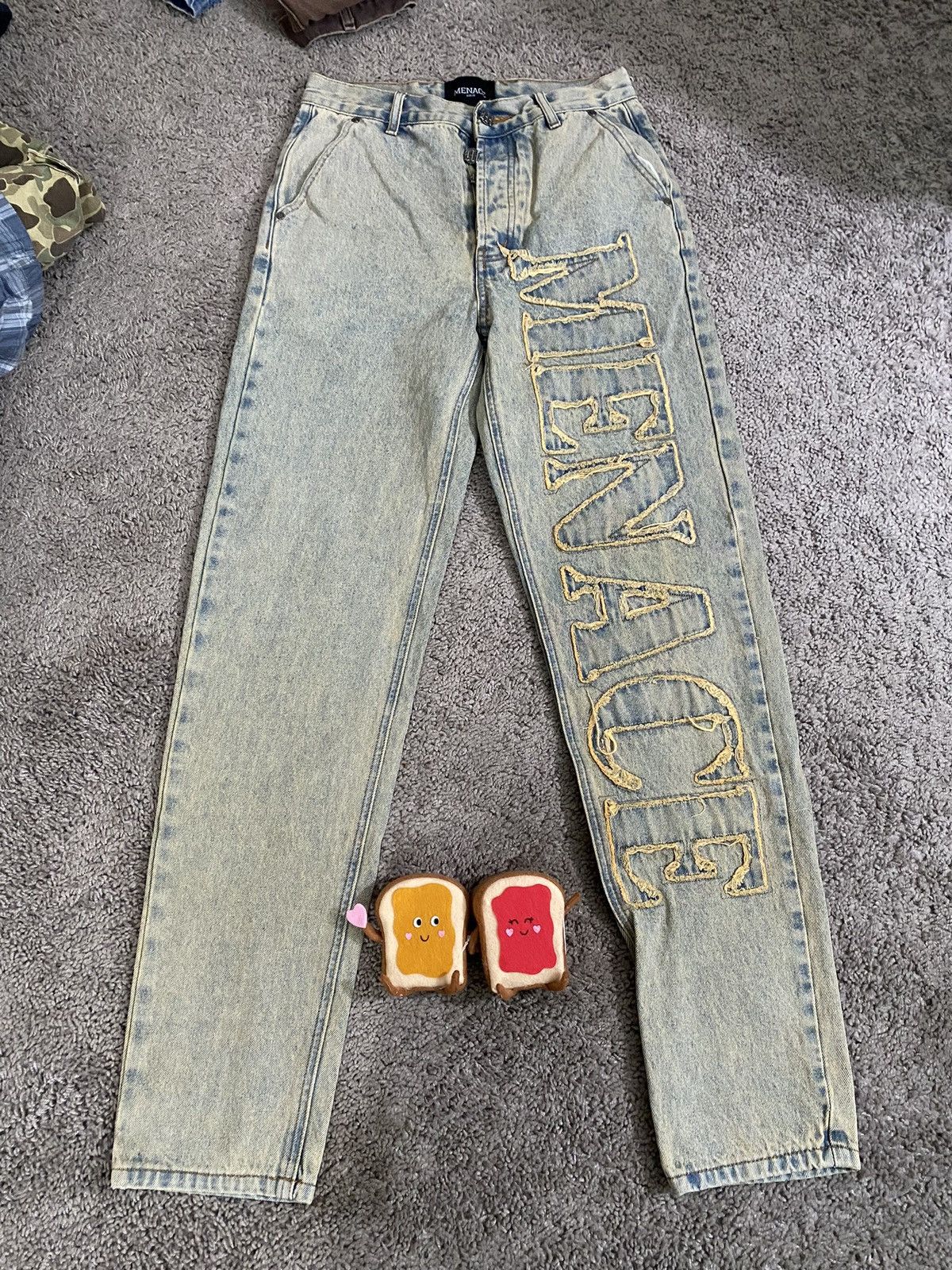 Menace Menace distressed stencil denim pants | Grailed