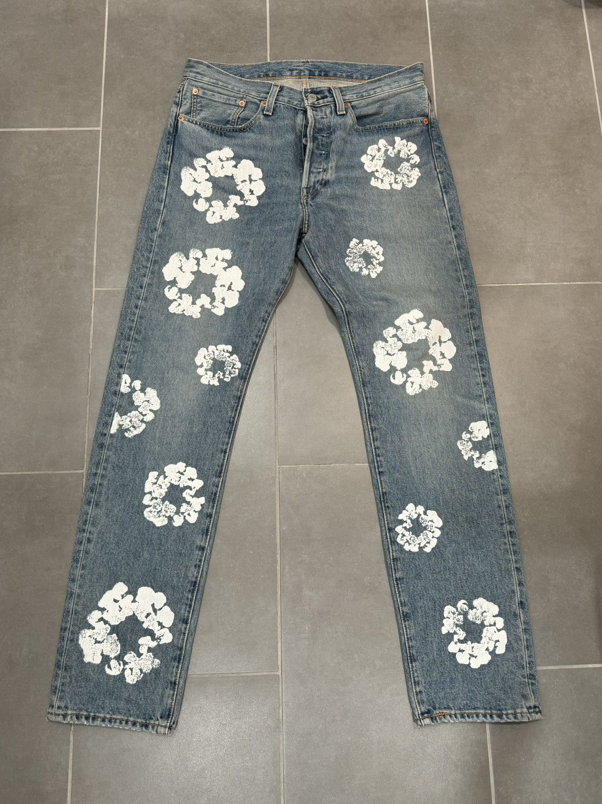DENIM TEARS Denim tears Light blue Cotton wreath jeans | Grailed