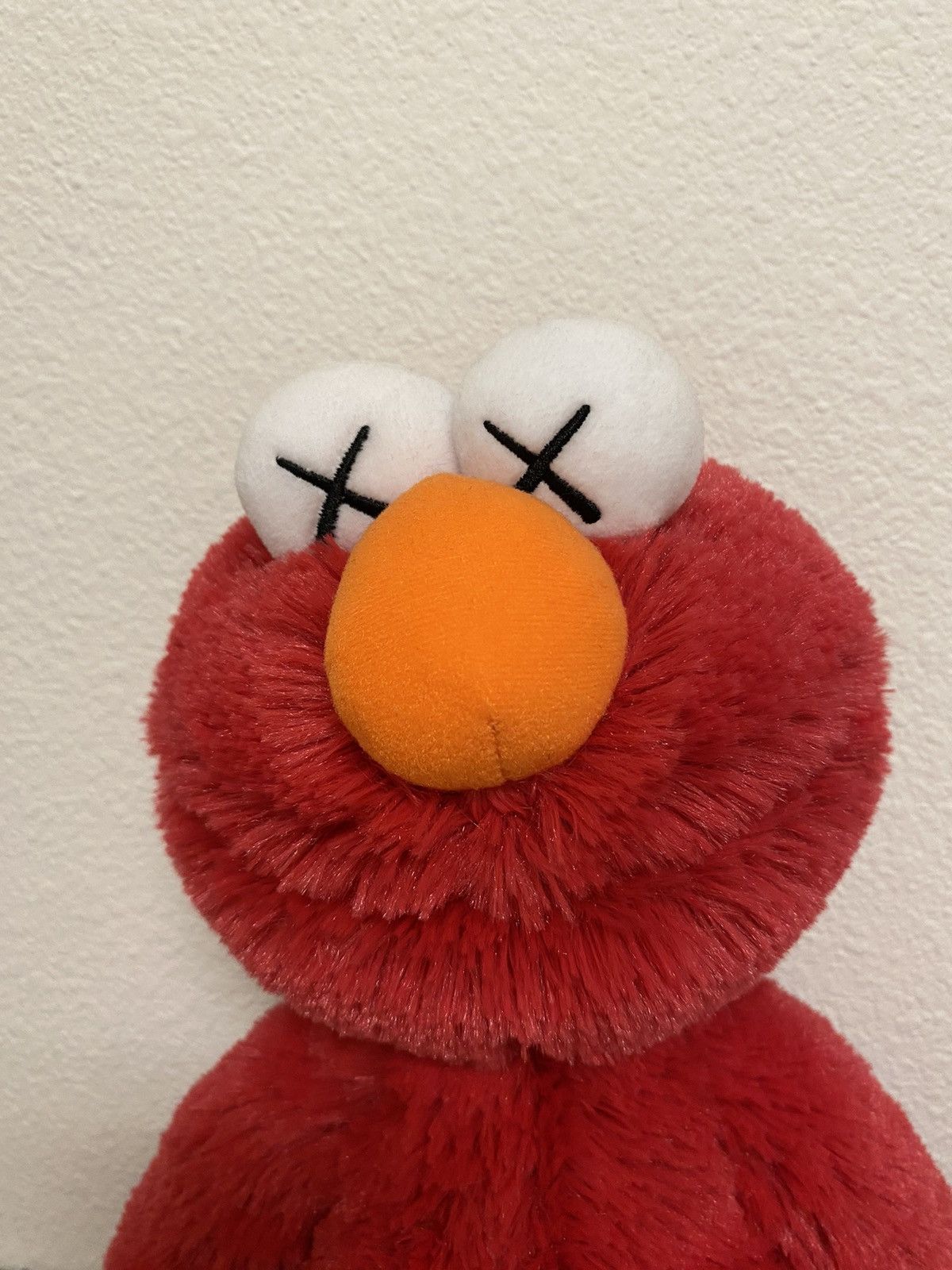 Uniqlo Kaws x Sesame Street Elmo Plush (no box) | Grailed