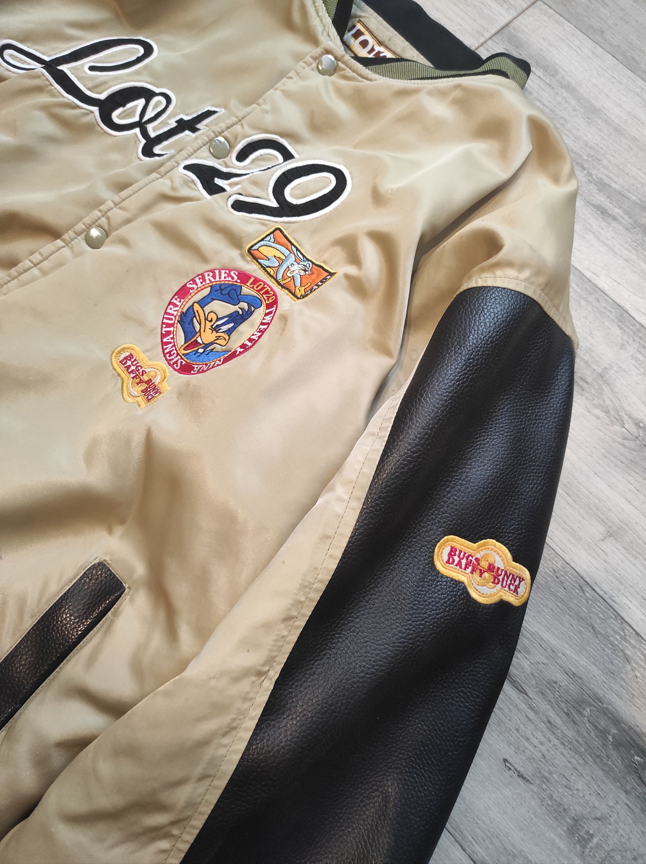 Warner Bros Vintage lot 29 leather bomber jacket looney tunes | Grailed