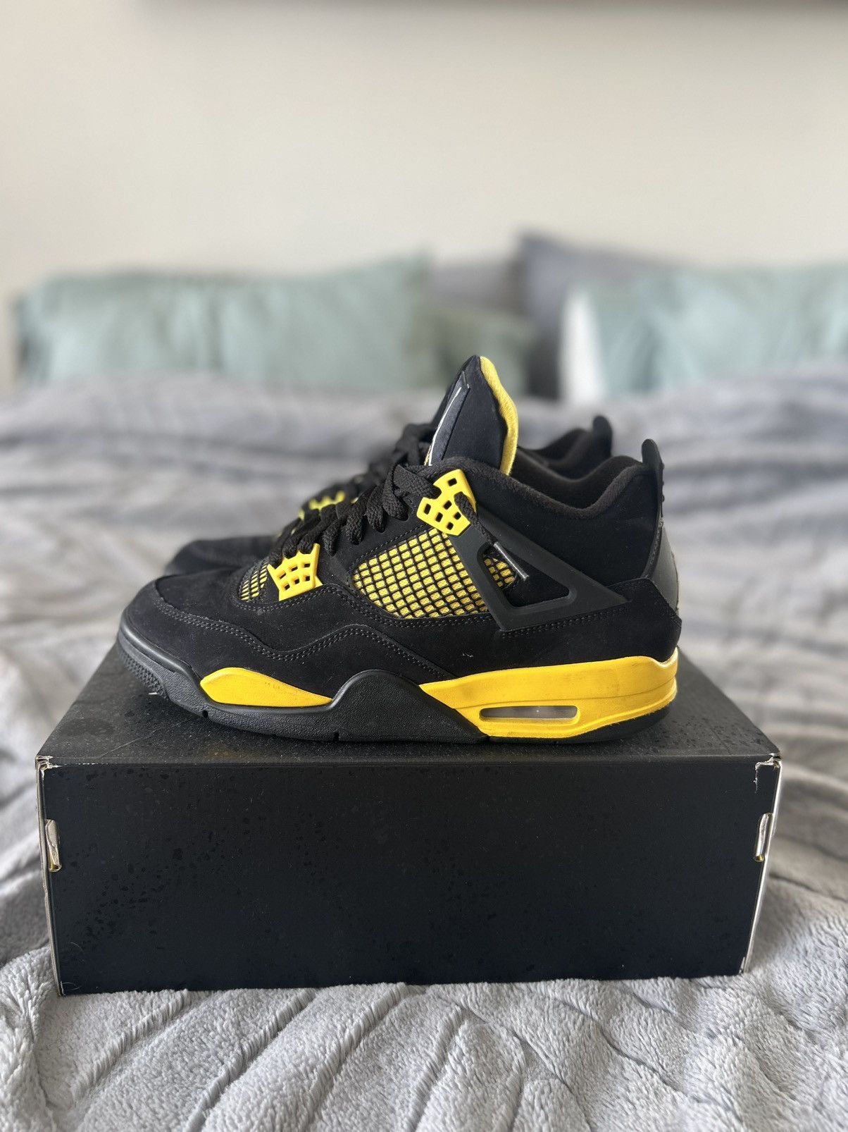 Jordan Brand Yellow Thunder Jordan 4’s | Grailed