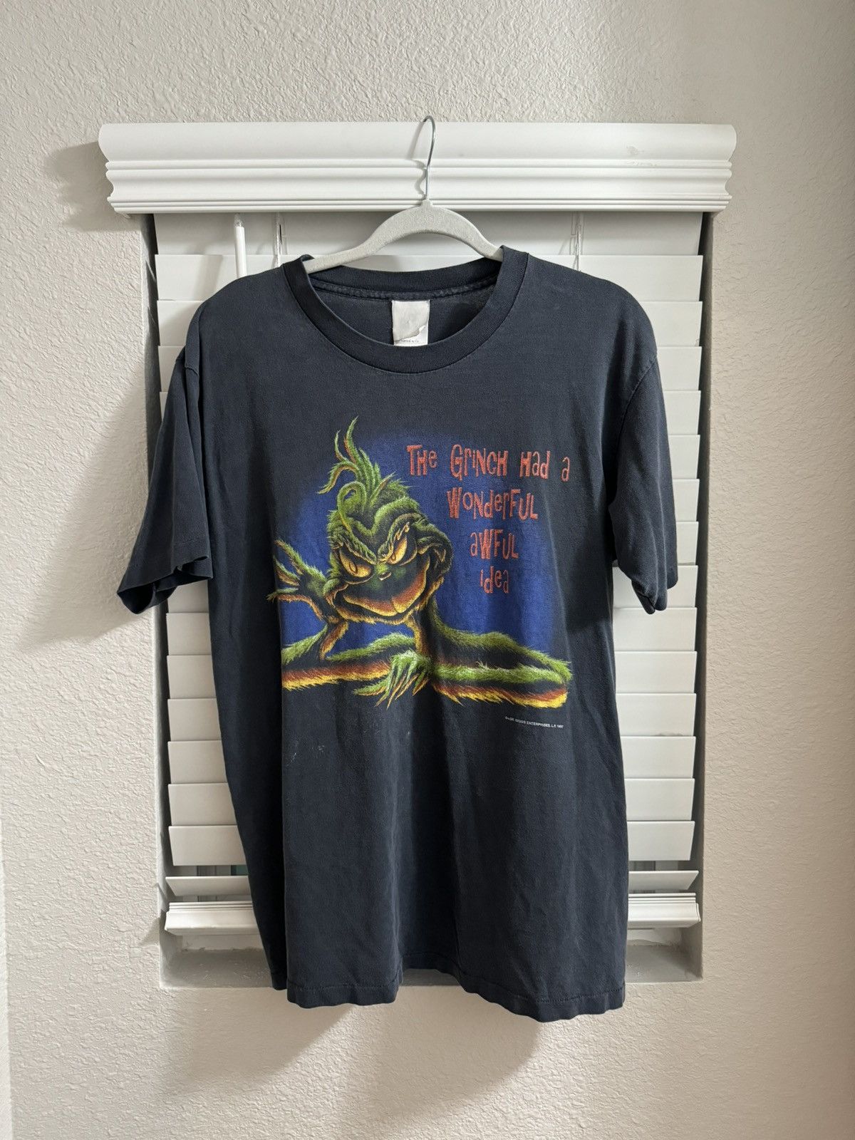 Universal Studios × Vintage 1997 the grinch promo tee | Grailed