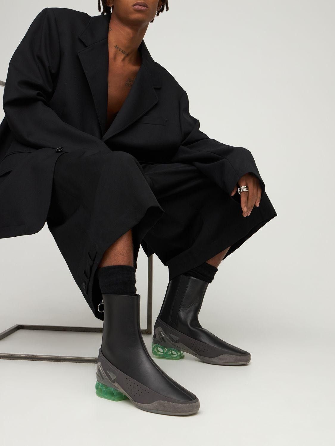 Raf Simons RAF Simons cycloid boots in grey/black | Grailed