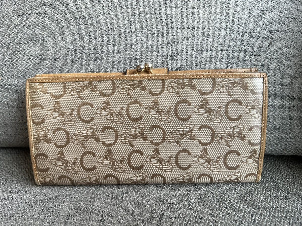 Celine Celine horse and carriage monogram bifold kiss lock wallet | Grailed
