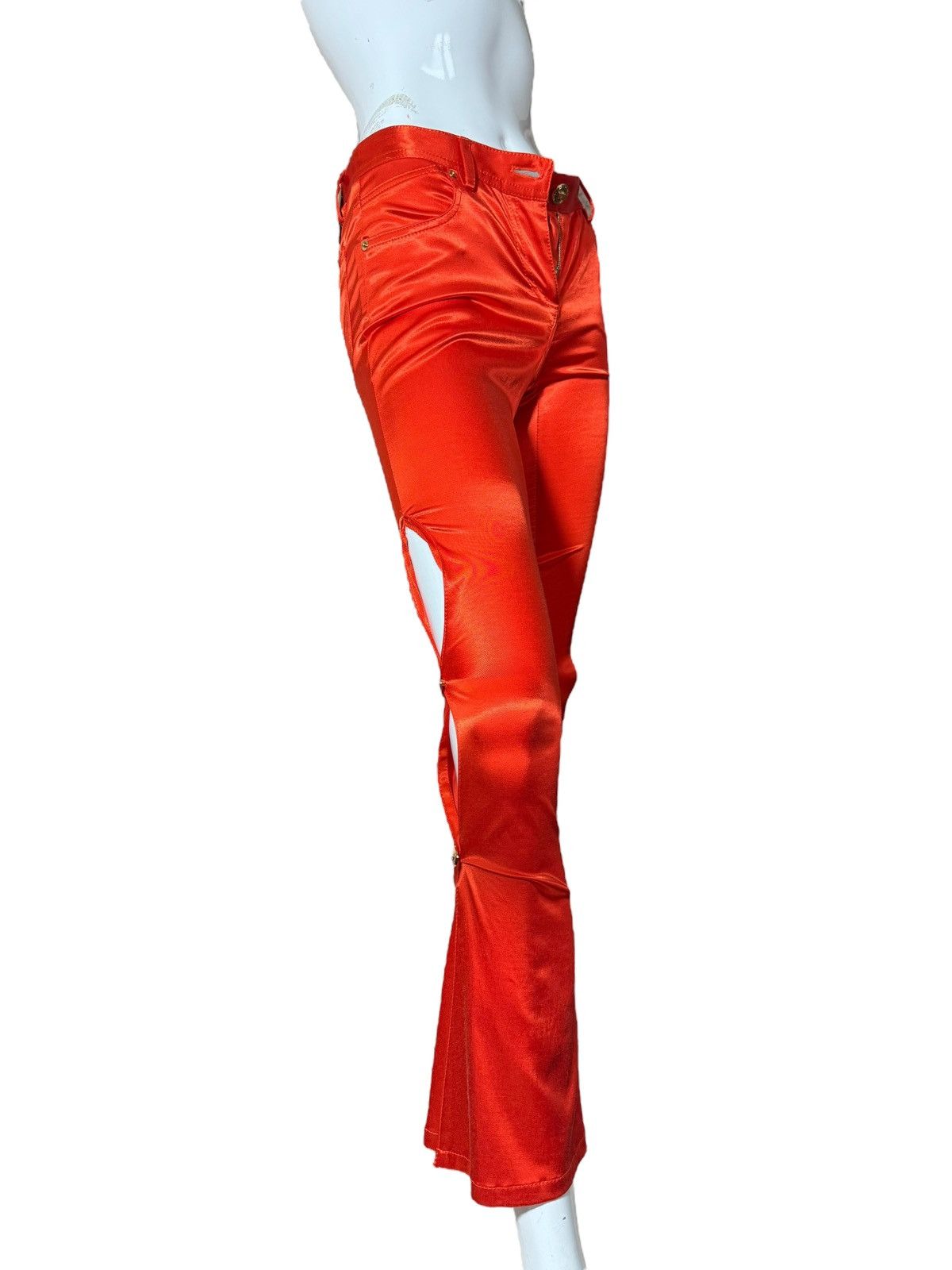 Versace Versace red satin pants with leg cut-outs and Medusa buttons ...